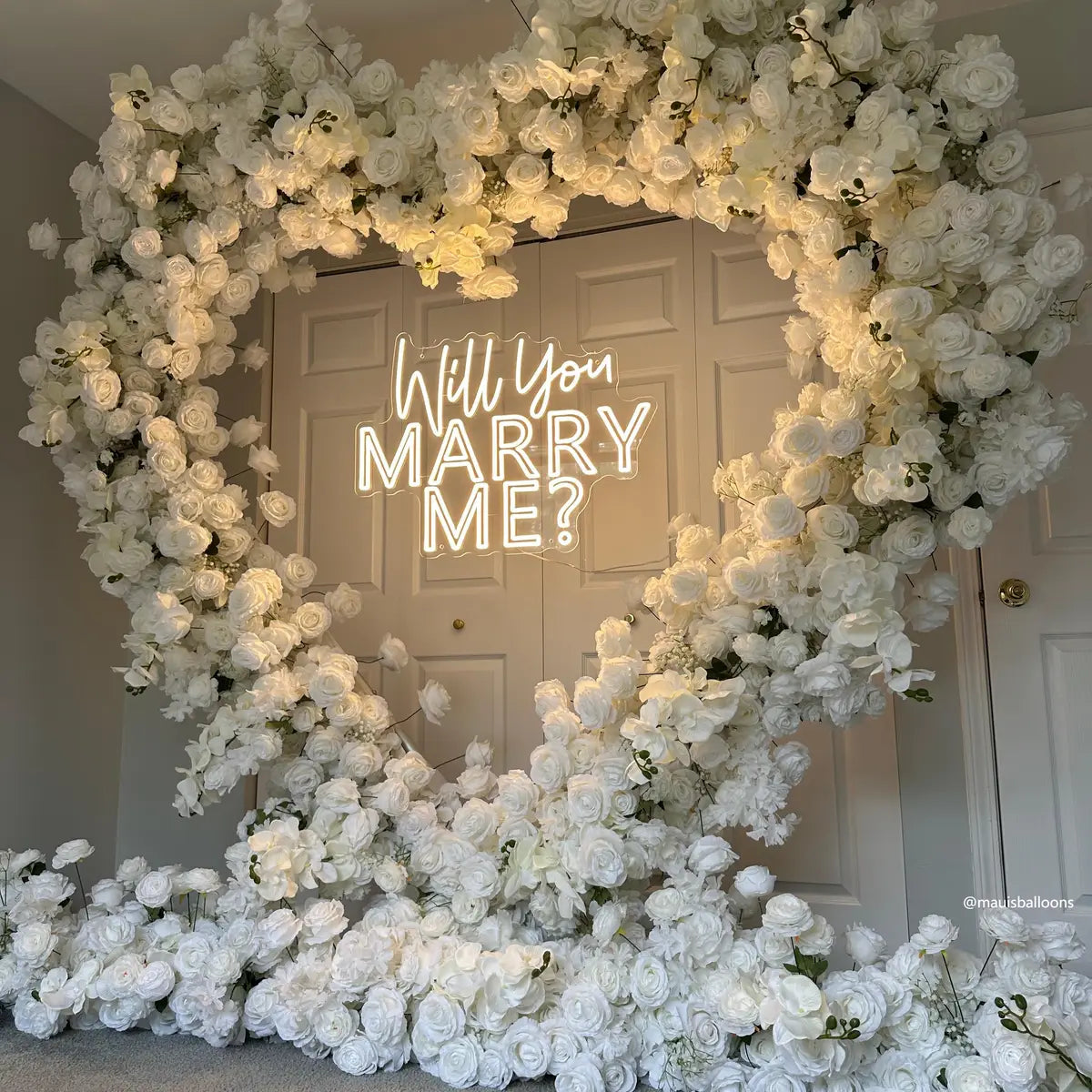 The white rose heart-shaped flower arch features a fabric backing ...